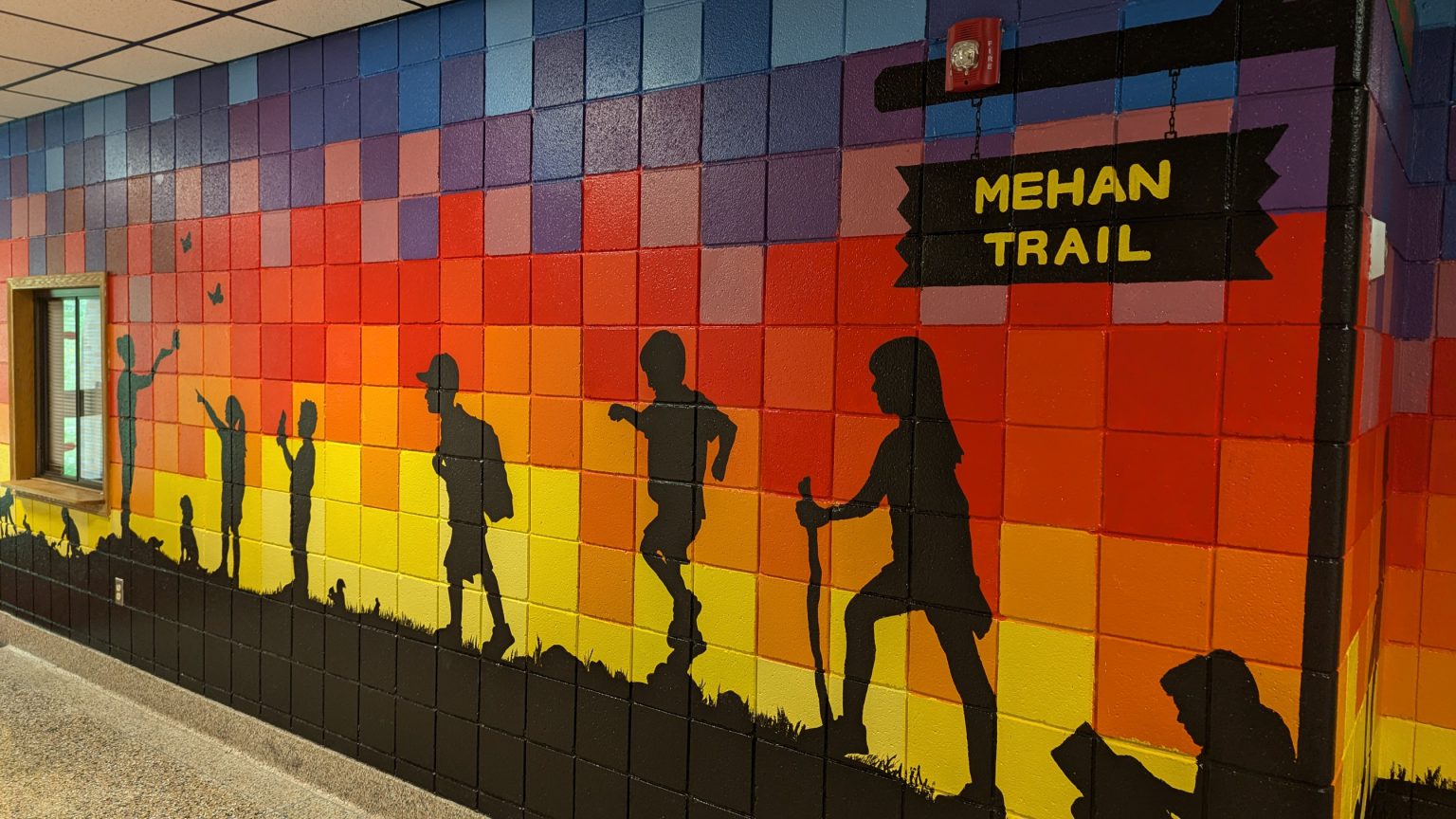 Elementary school art mural in memory of teacher Dave Mehan ...
