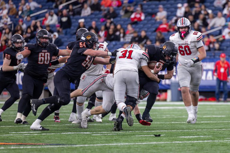 Varsity football team wins first state title in program history ...